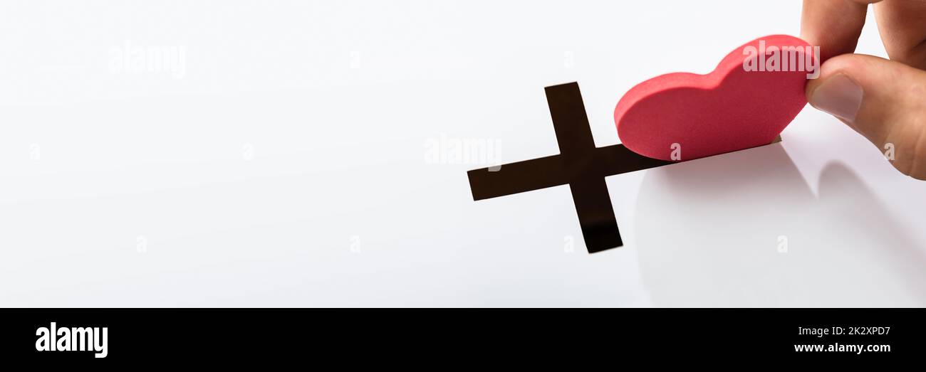 Insert Heart Shape In Crucifix Slot Stock Photo - Alamy