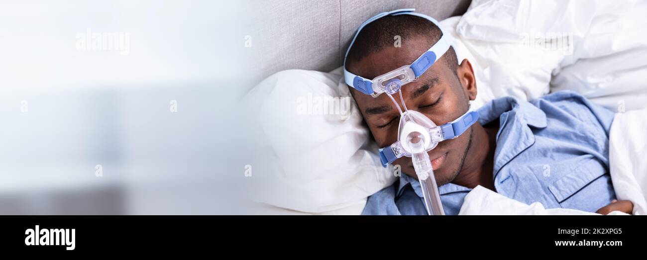 Young african male wearing hi-res stock photography and images - Alamy