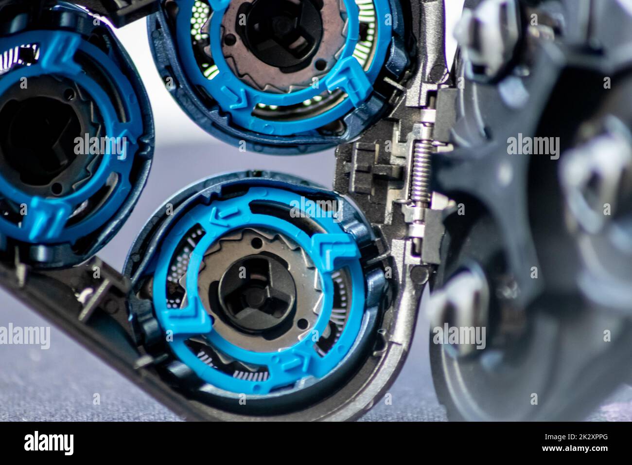 Macro close-up of electrical shaver blades triple technology for ...