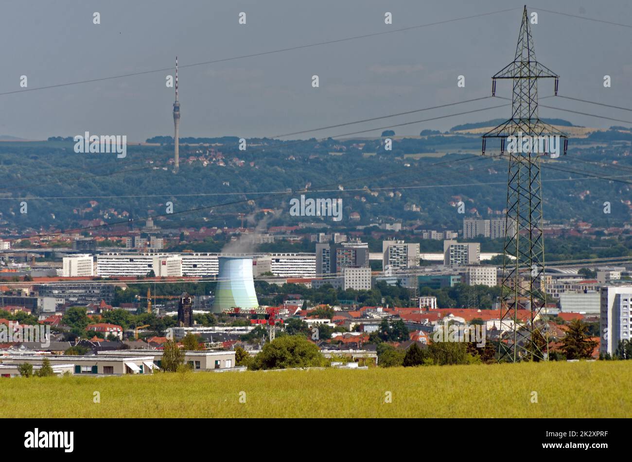Dresden TV tower and high-voltage pylon Stock Photo - Alamy