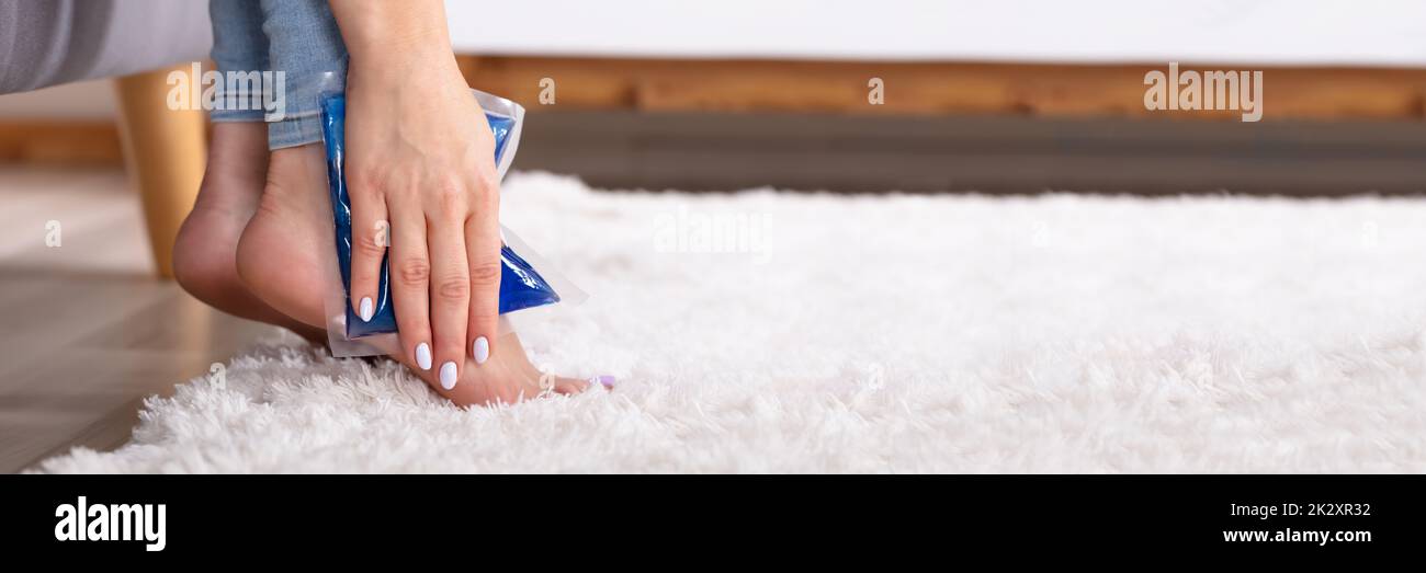 Woman ice pack feet hi-res stock photography and images - Alamy