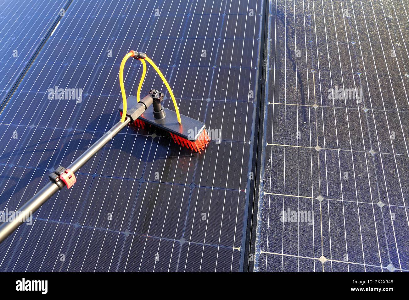 Cleaning solar panels brush water hi-res stock photography and images ...
