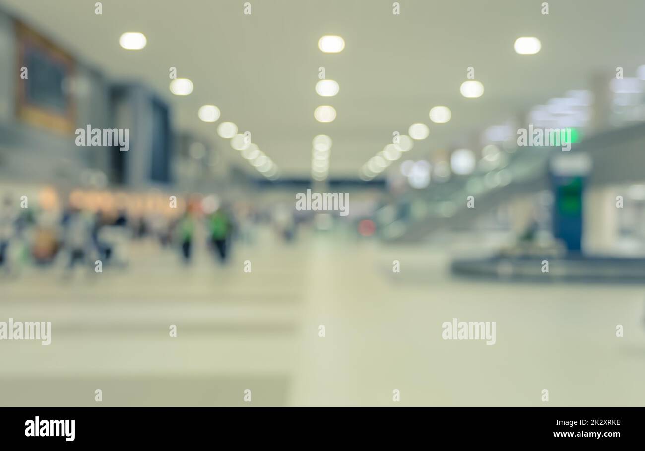 Blurred airport terminal interior with passengers background Stock ...