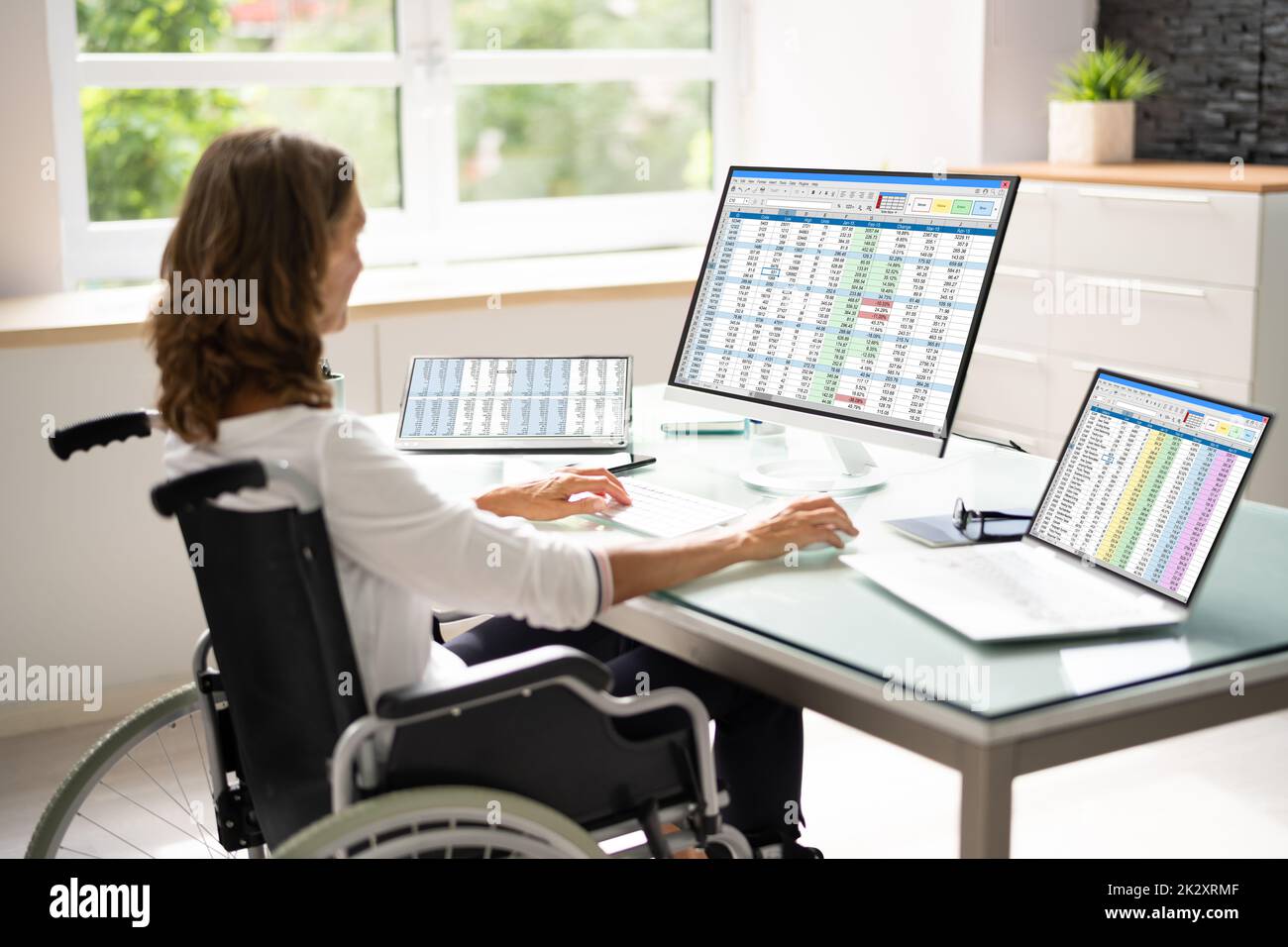 Woman coding on desktop computer hi-res stock photography and images ...