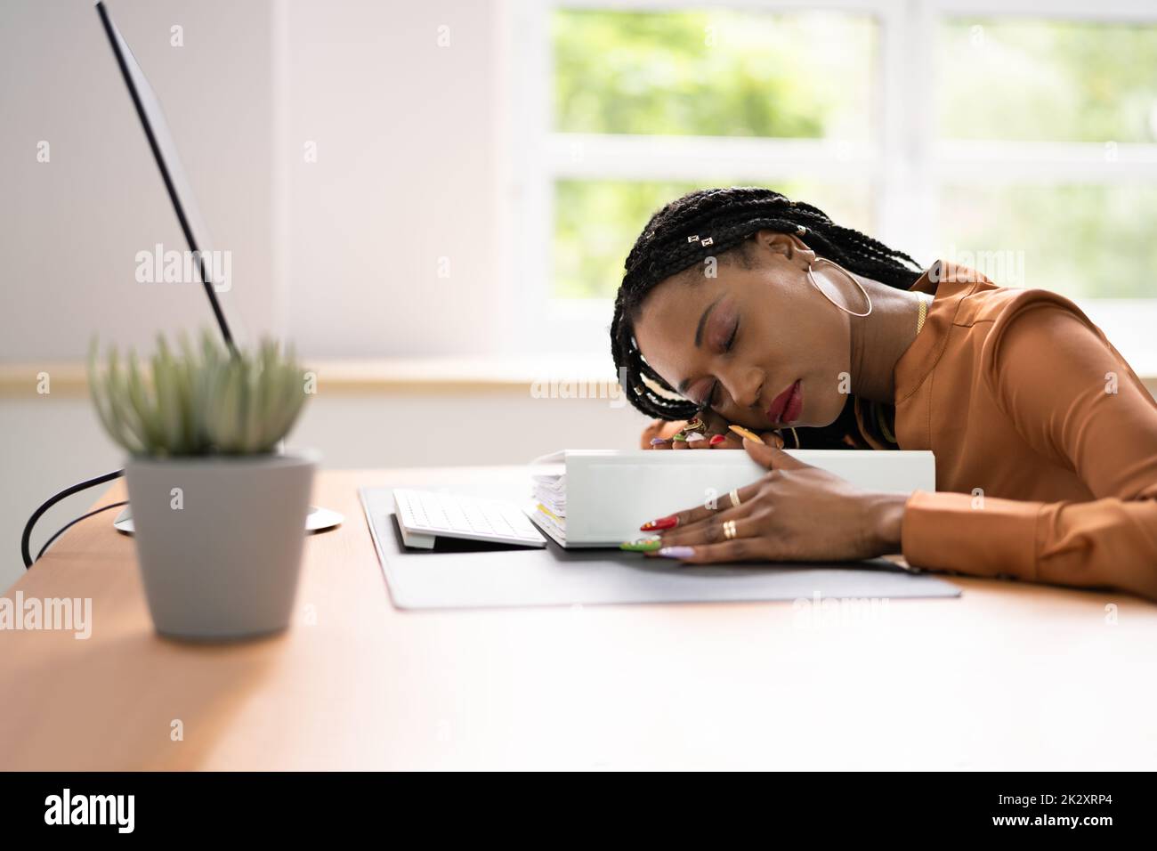 Bored Boss Woman Sleeping Stock Photo - Alamy