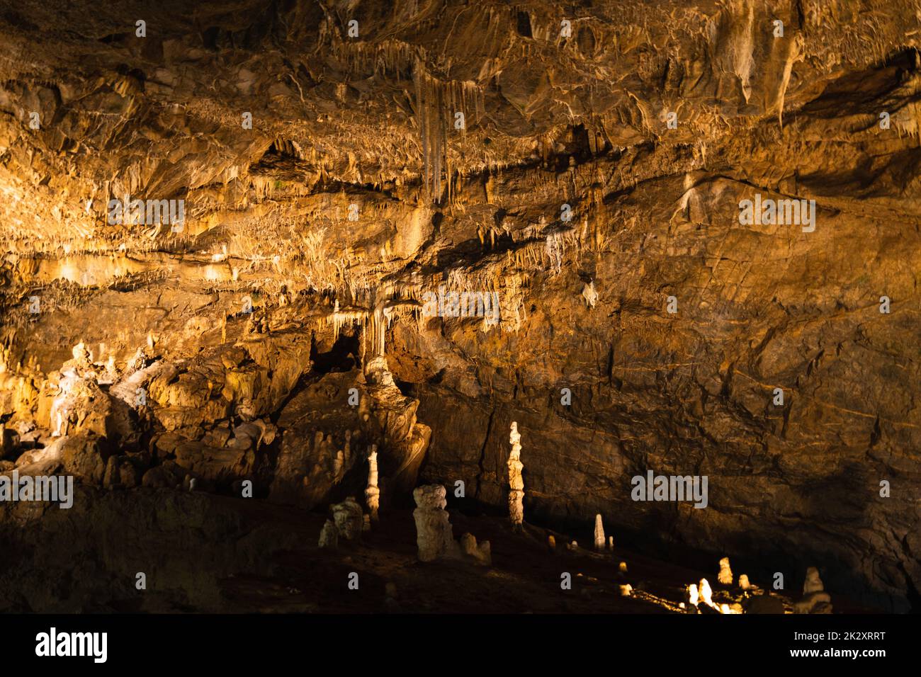 Cave with stalactites and stalagmites. The geological formation of ...