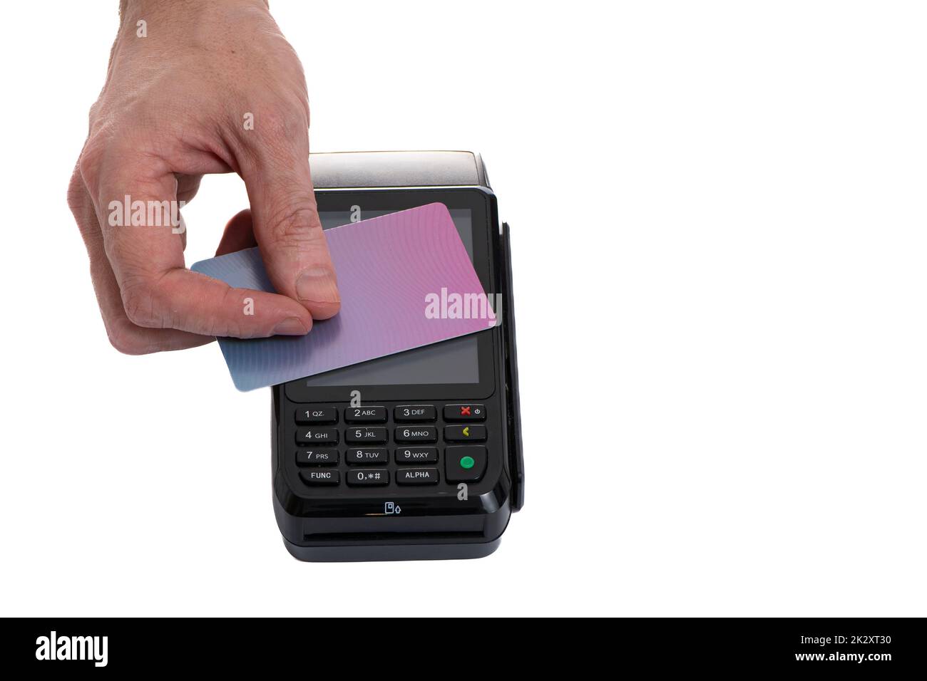 Attached plastic card to the payment terminal with a man's hand on a ...