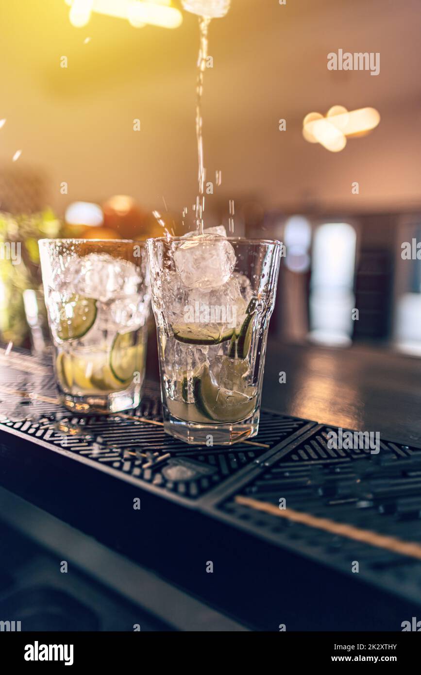 Bartender making cocktail bar counter hi-res stock photography and ...