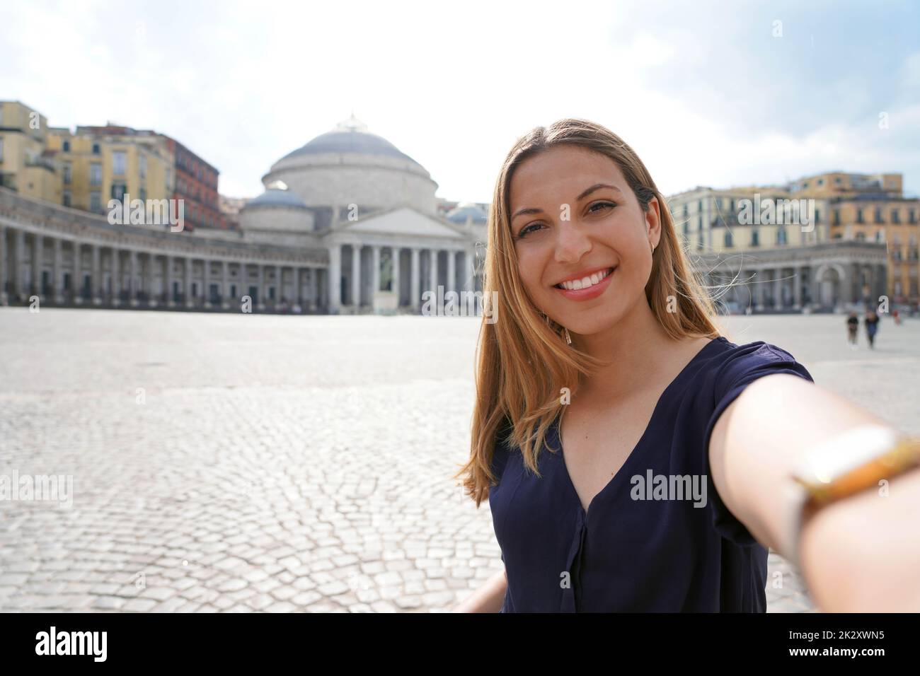 Happy smiling girl taking selfie photo in Naples with Piazza del ...