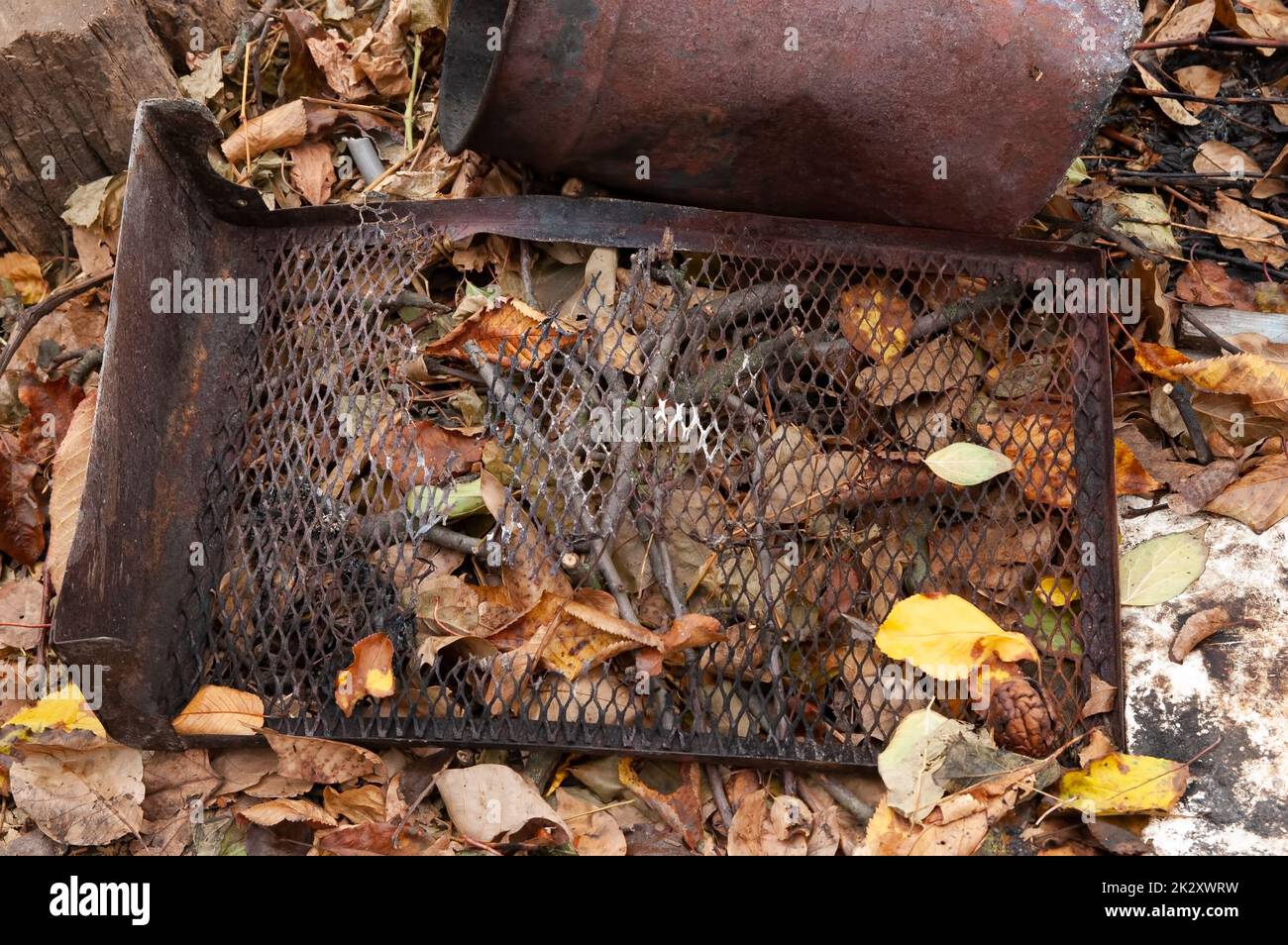 Rusty iron among the fallen autumn leaves Stock Photo - Alamy