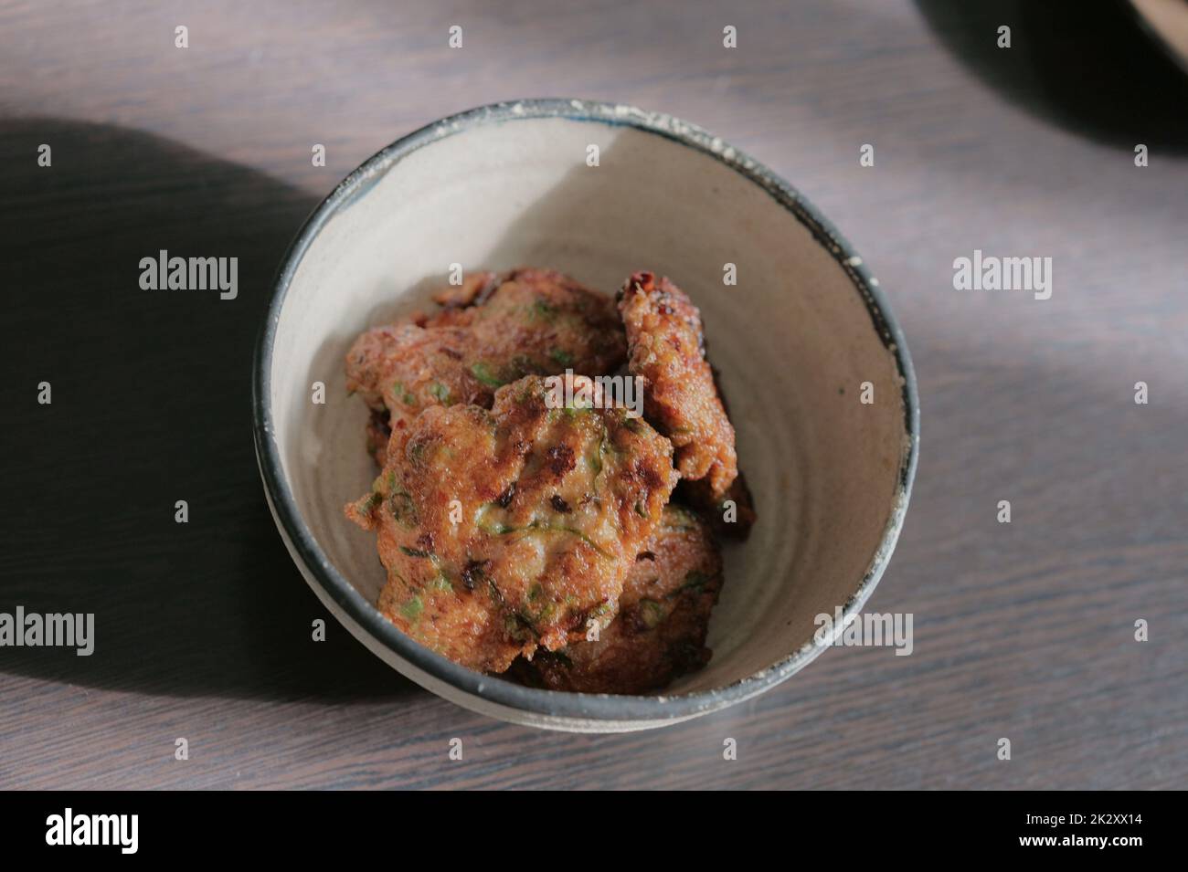 Fried fish-paste balls in bowl , THAI food Stock Photo - Alamy