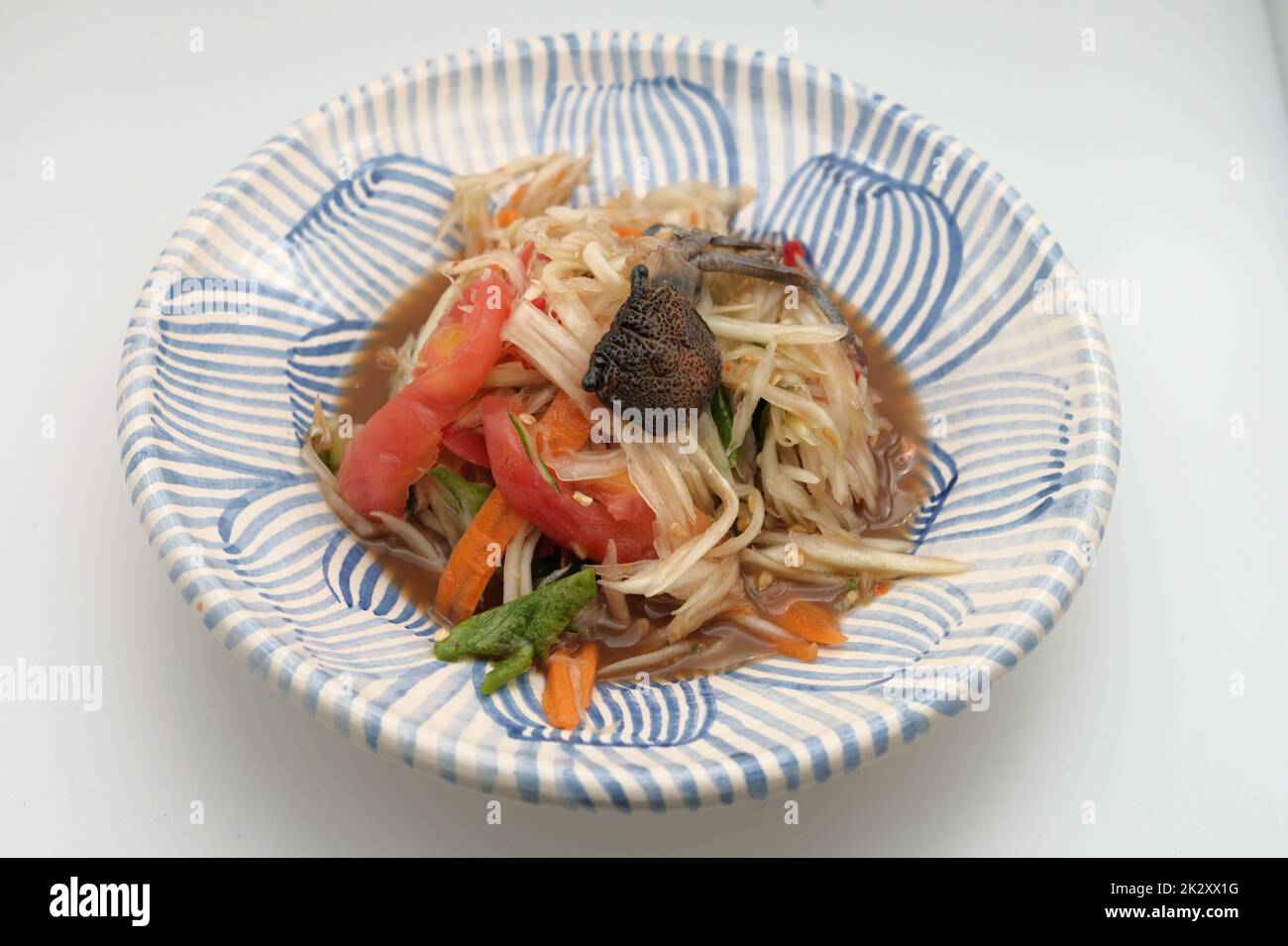 Delicious Som Tam -Thai green papaya salad with green beans, tomatoes. Thai street food Stock ...