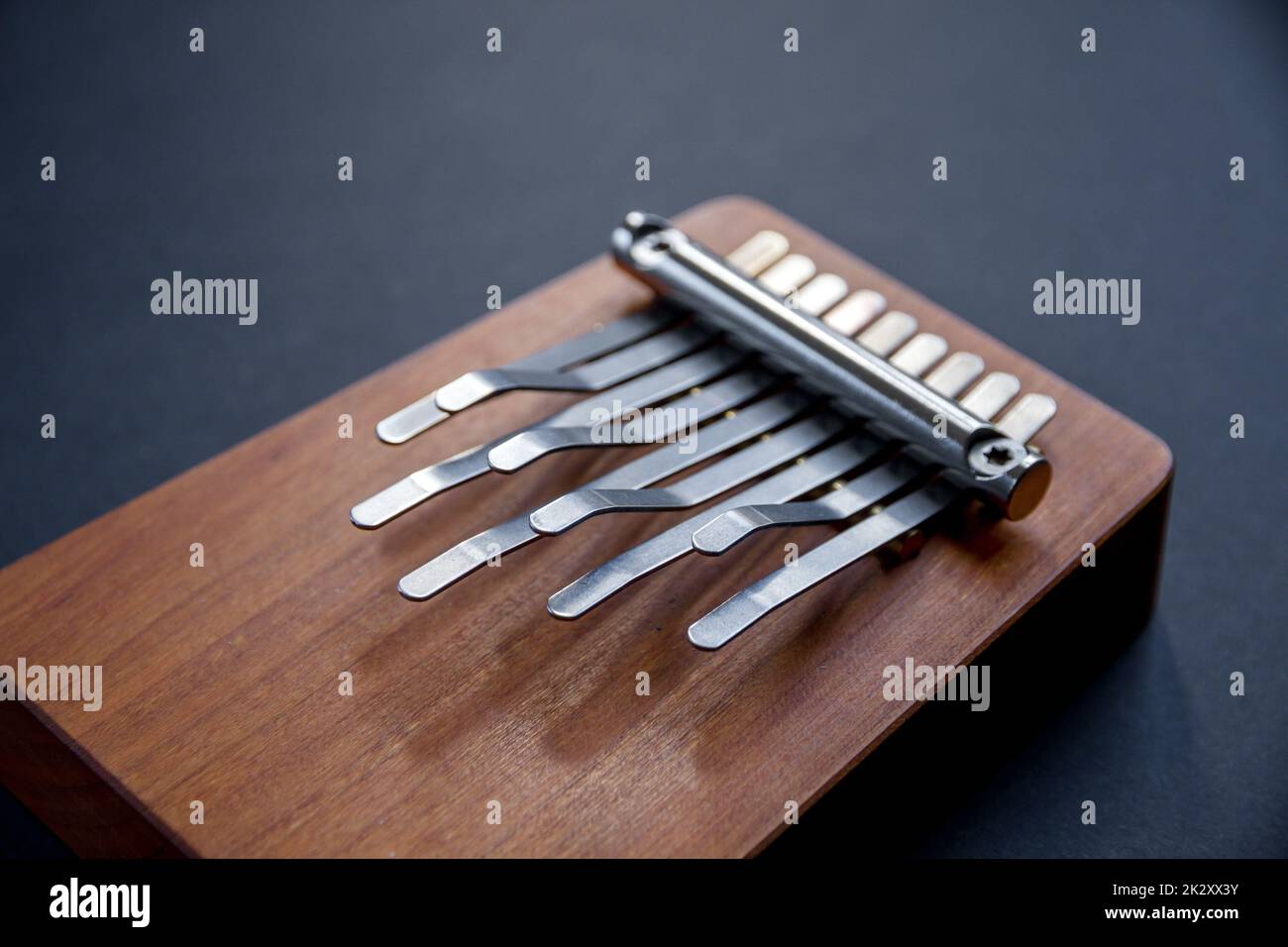 Traditional wooden kalimba isolated on black Stock Photo - Alamy