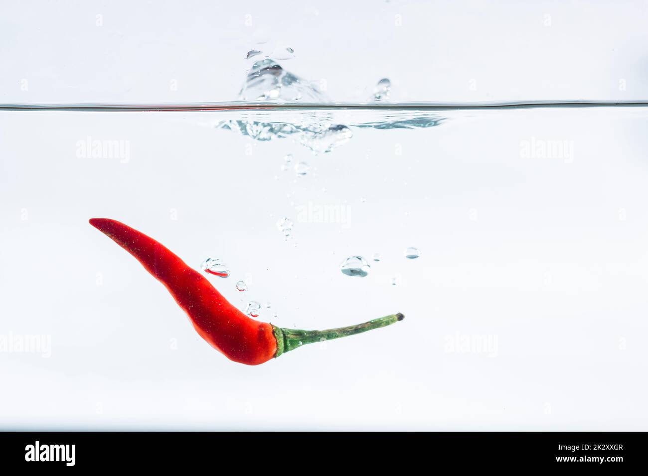 Pouring water on red green hi-res stock photography and images - Alamy