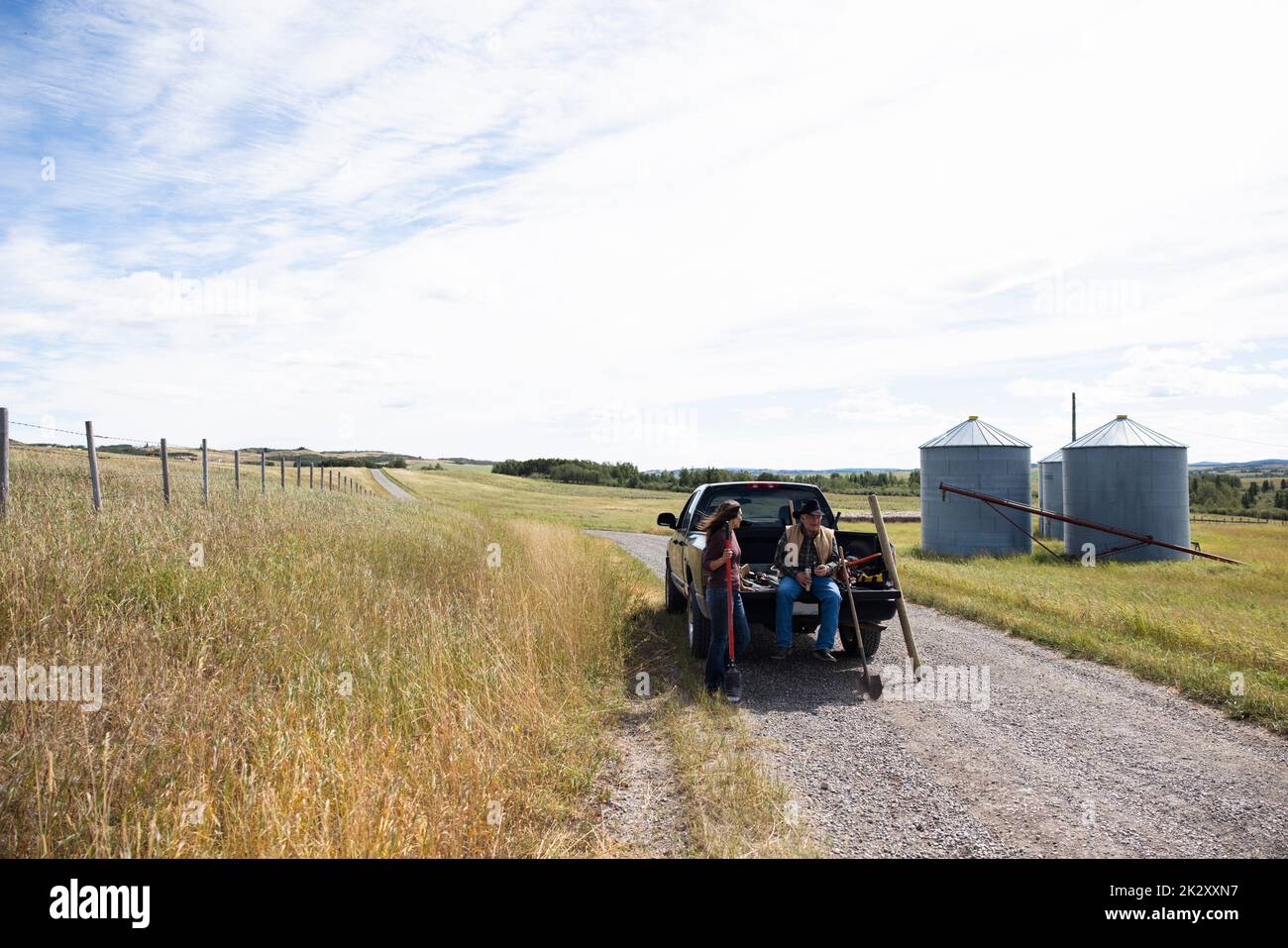 Man sitting on truck tailgate hi-res stock photography and images - Alamy