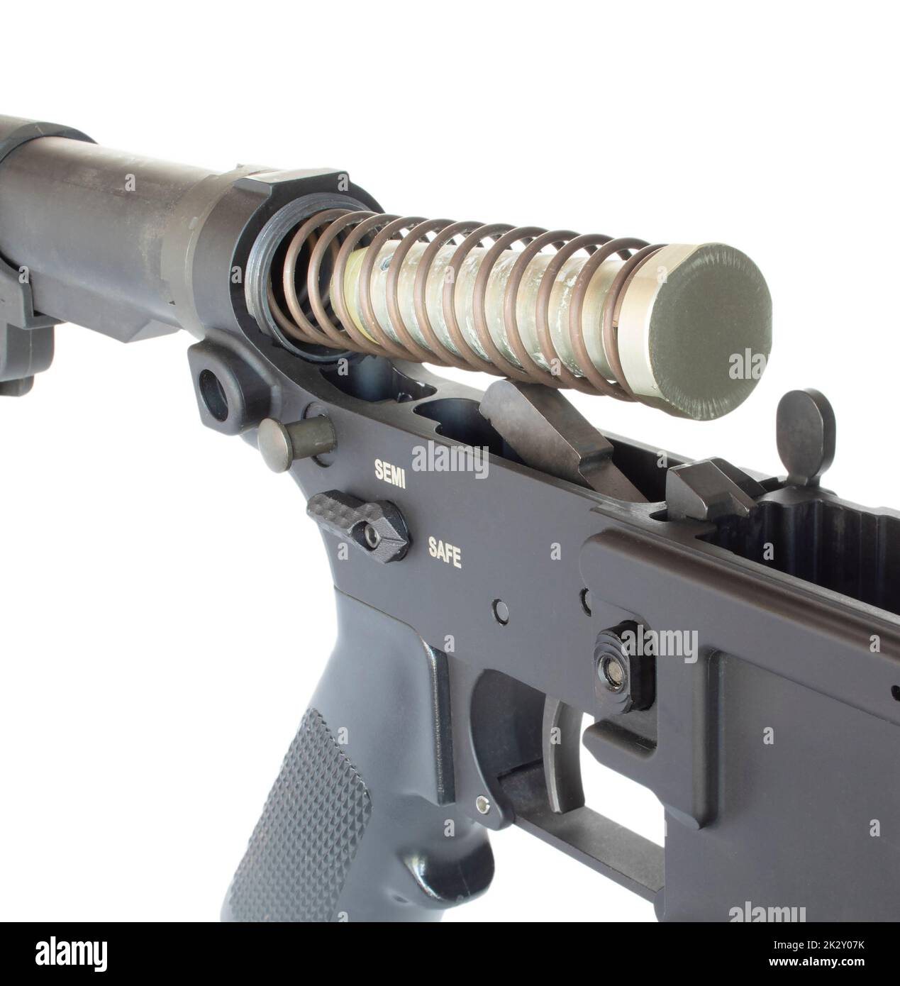 Spring and buffer weight coming out of an assault rifle on white Stock ...