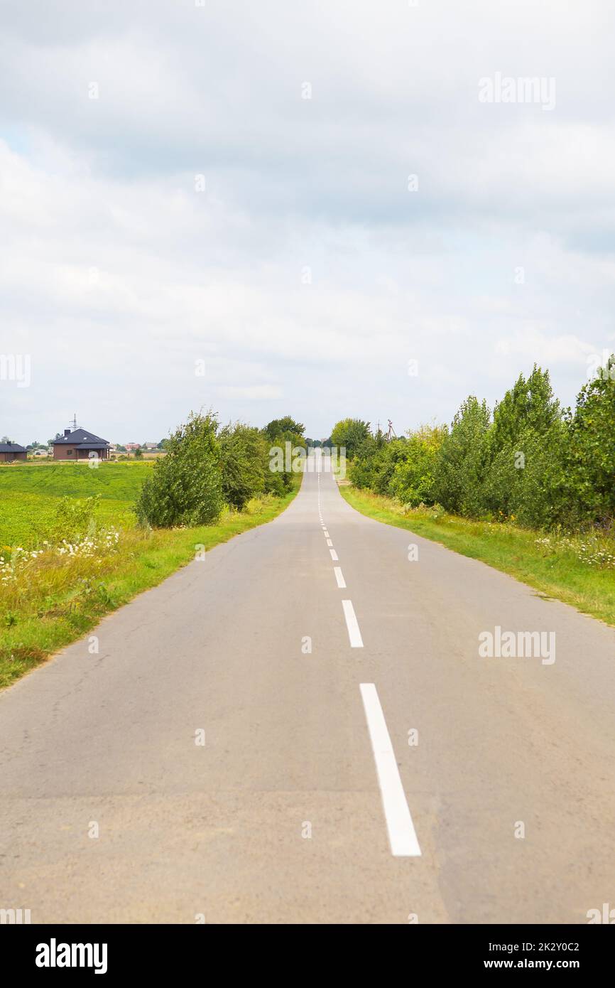 rural, asphalt road in green field Stock Photo - Alamy