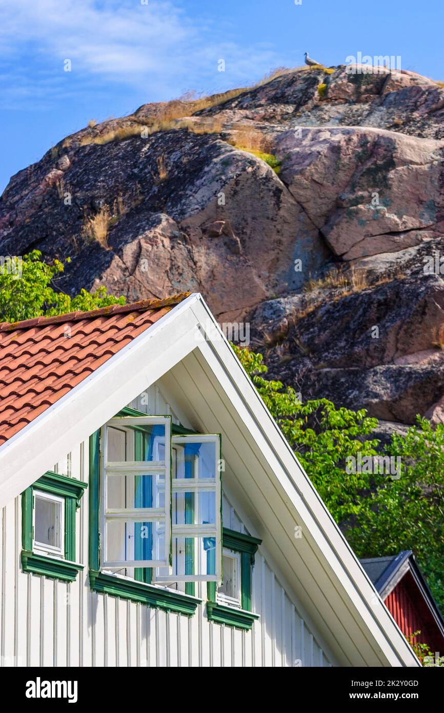 Cottage with open windows for ventilation Stock Photo - Alamy