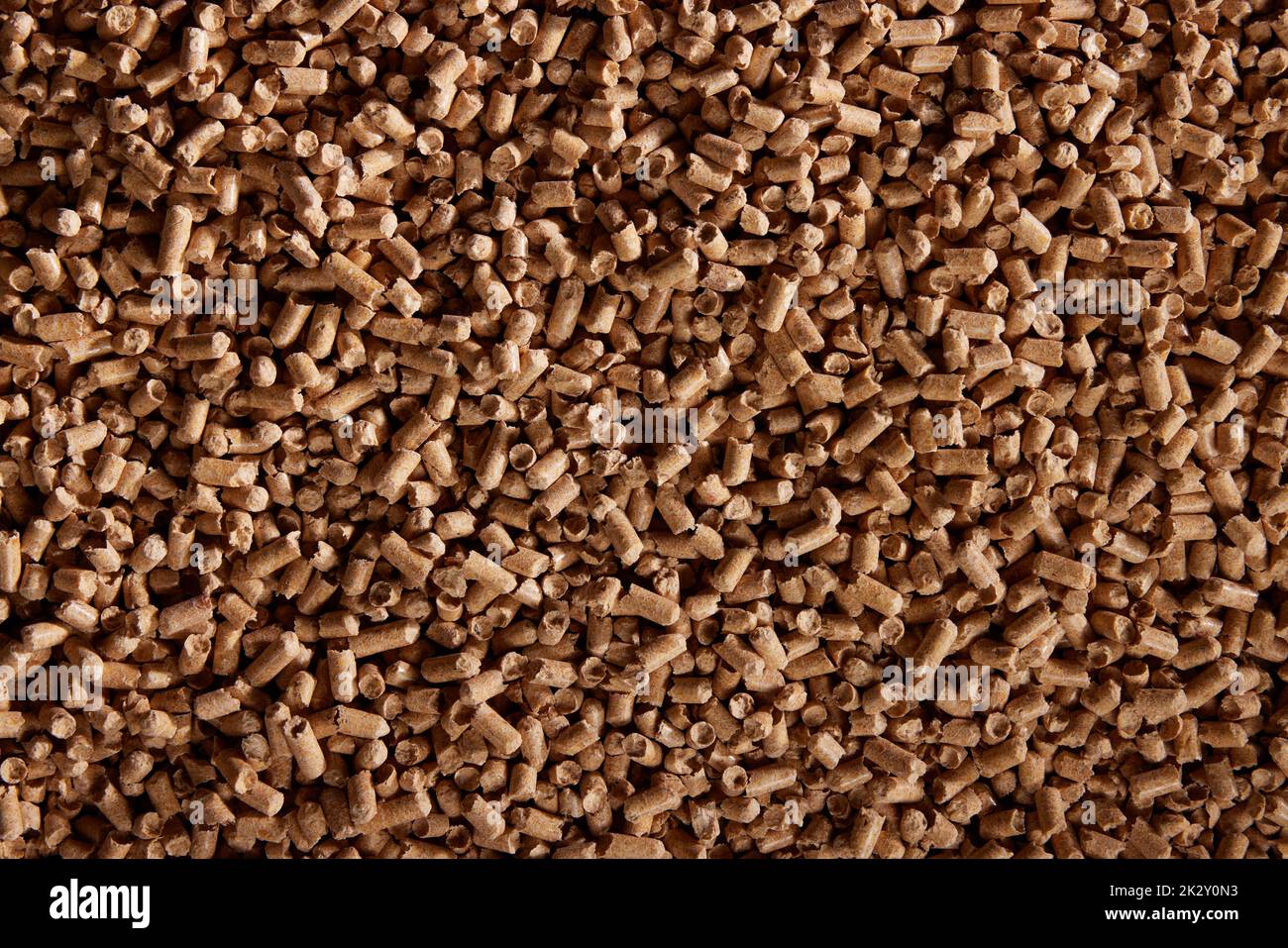 Pile of brown fuel pellets as abstract background Stock Photo - Alamy