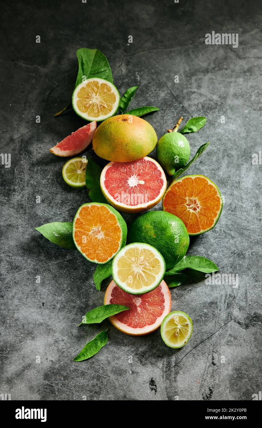 Halved ripe citrus fruits hi-res stock photography and images - Alamy