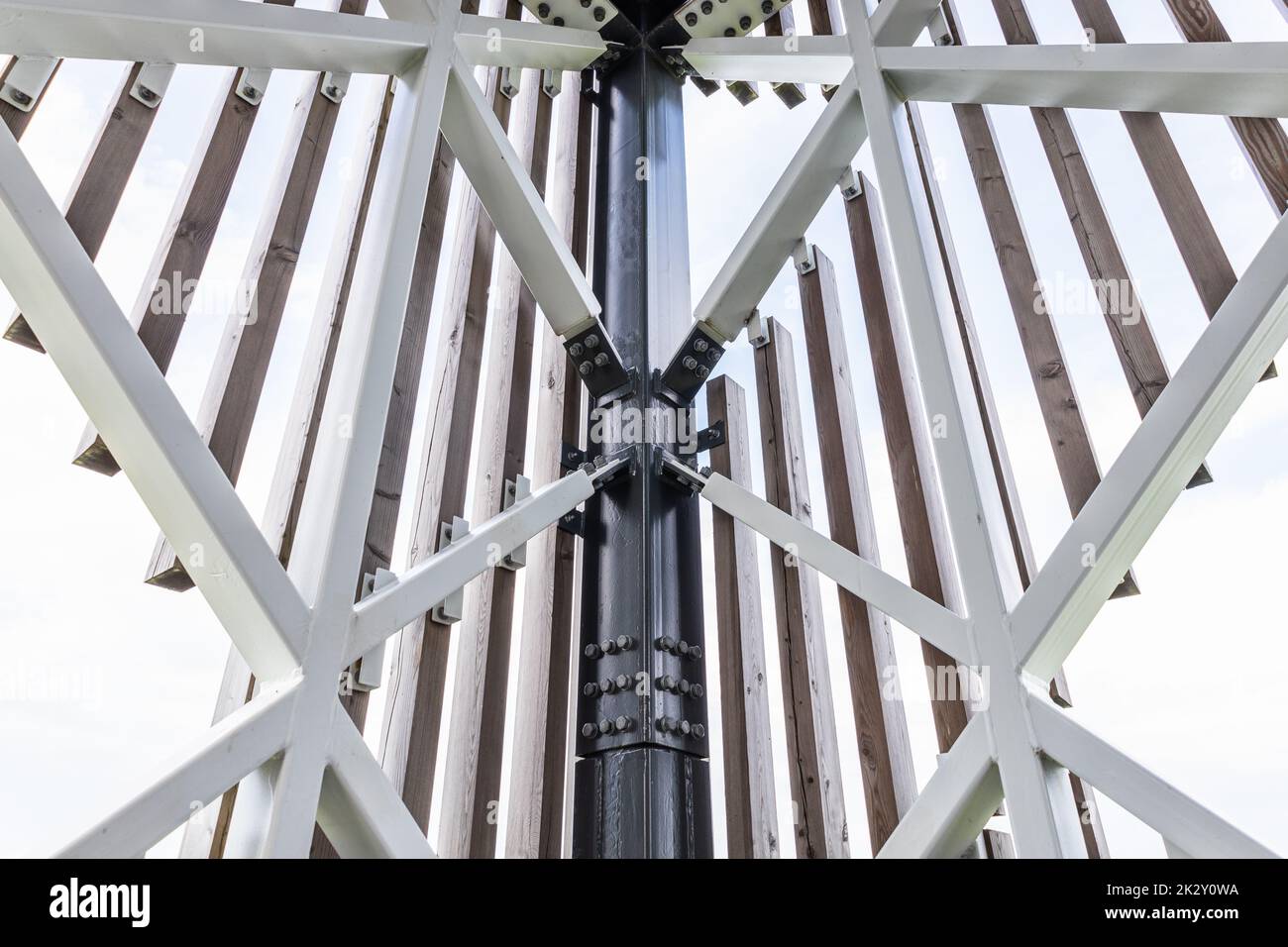 Massive steel beams end-to-end with bolts and nuts on the construction ...