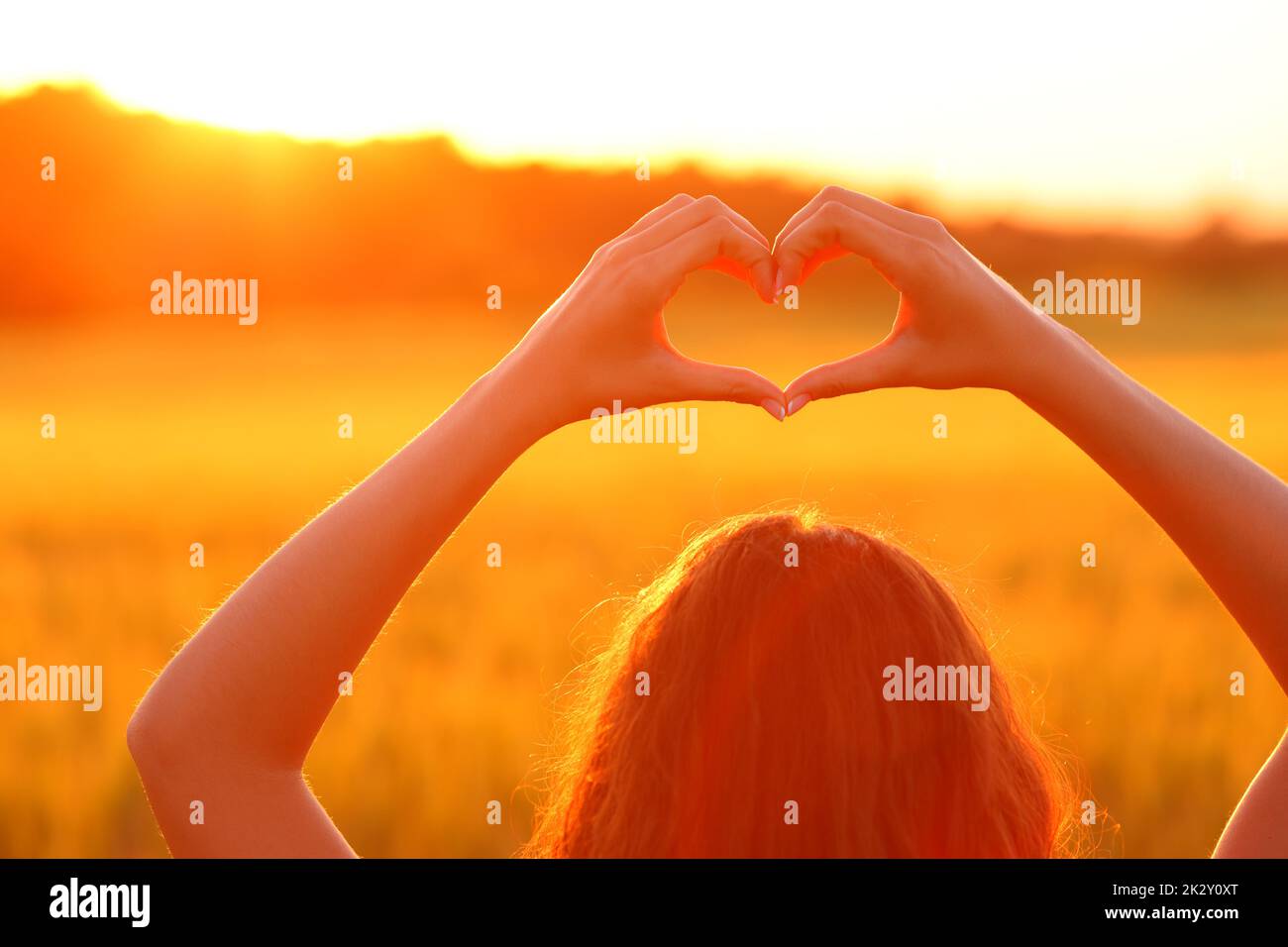 Making heart with arms hi-res stock photography and images - Alamy