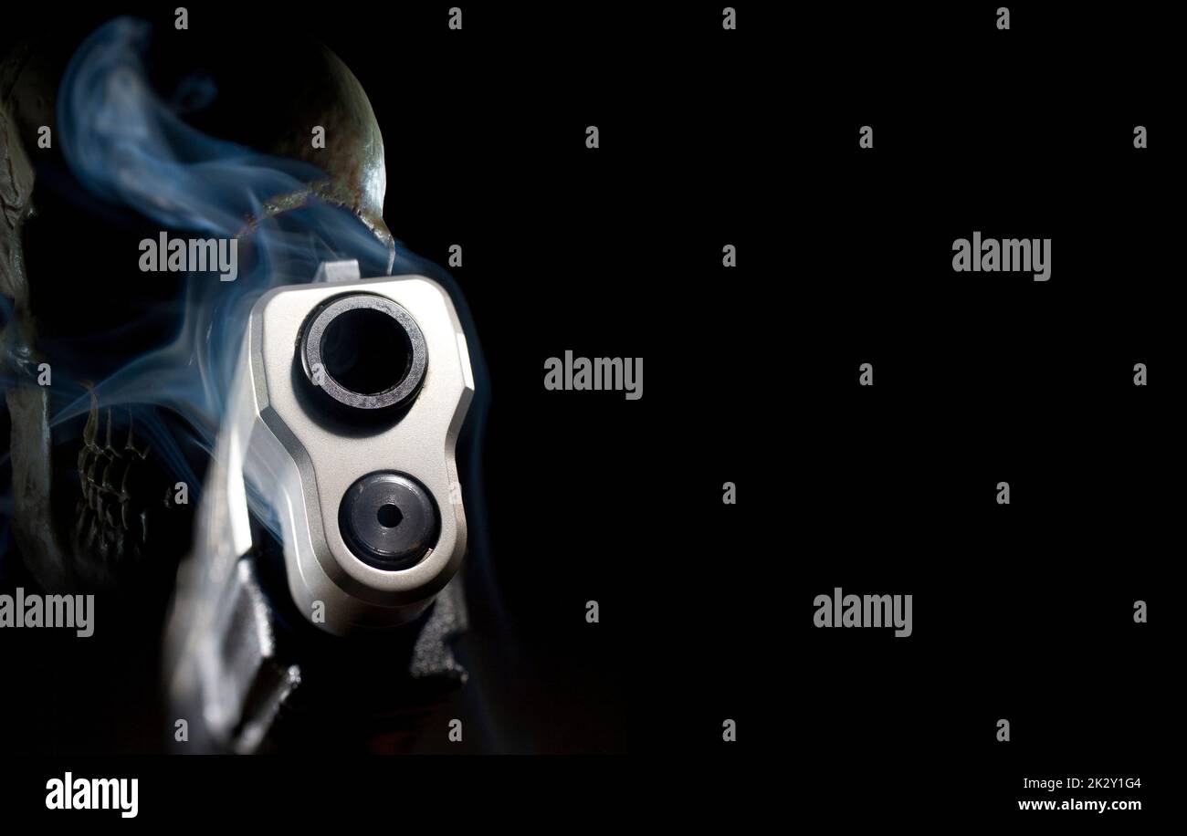 Smoking ghost gun handgun 3D illustration with a skul behind on a black ...