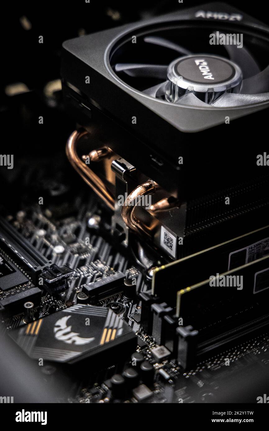 A vertical shot of a PC motherboard with cooler and heat sink Stock ...