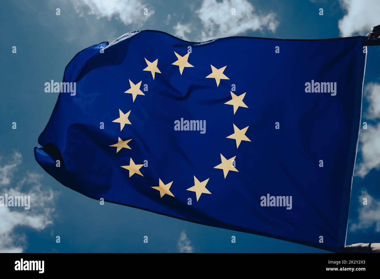 The flag of Europe waving in the wind Stock Photo - Alamy
