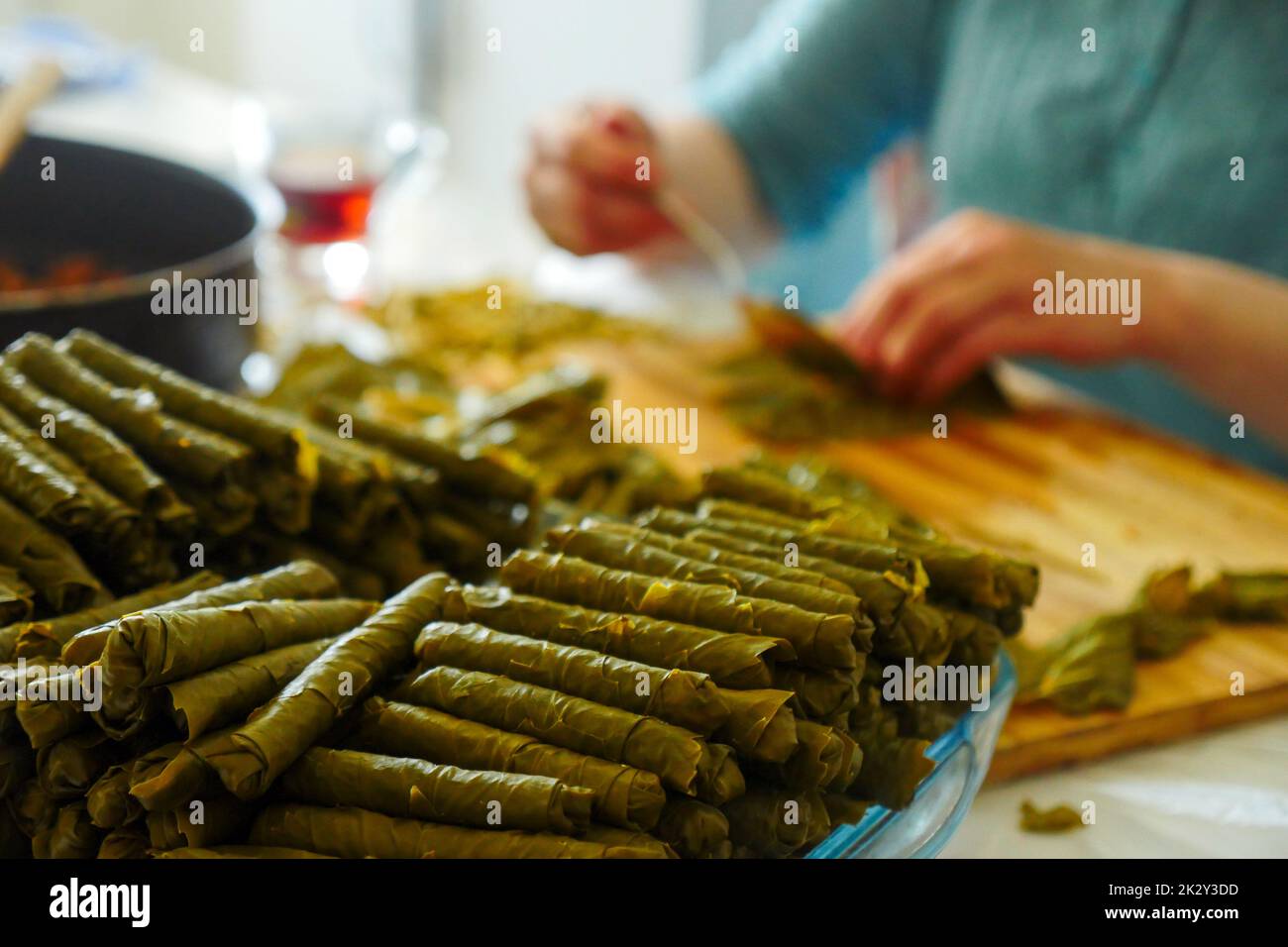 a cook making stuffed leaves, making stuffed leaves at home, stuffed ...