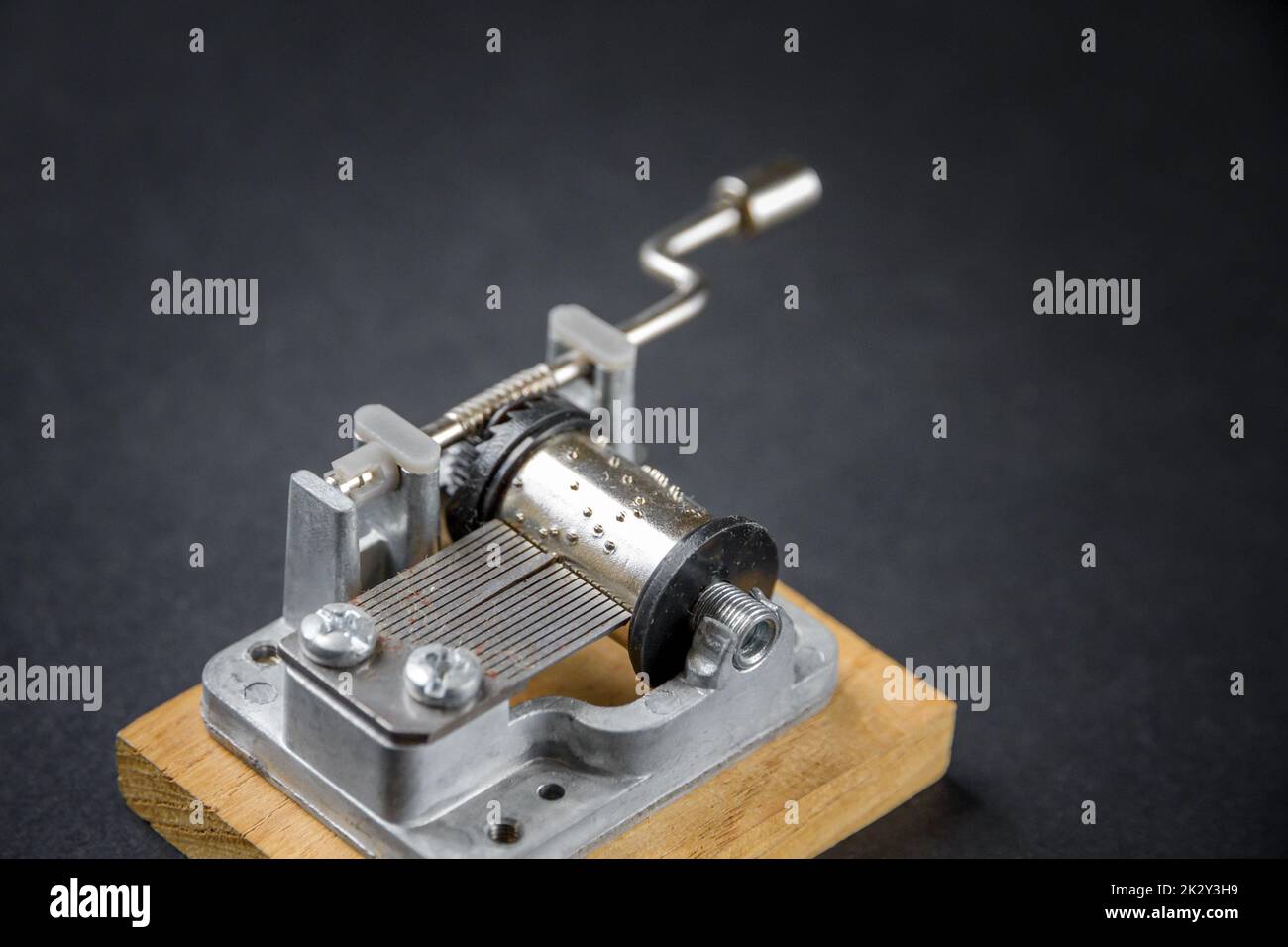 Traditional music box isolated on black Stock Photo - Alamy