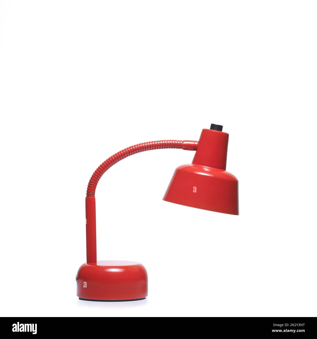 Desk lamp. Red color Stock Photo - Alamy