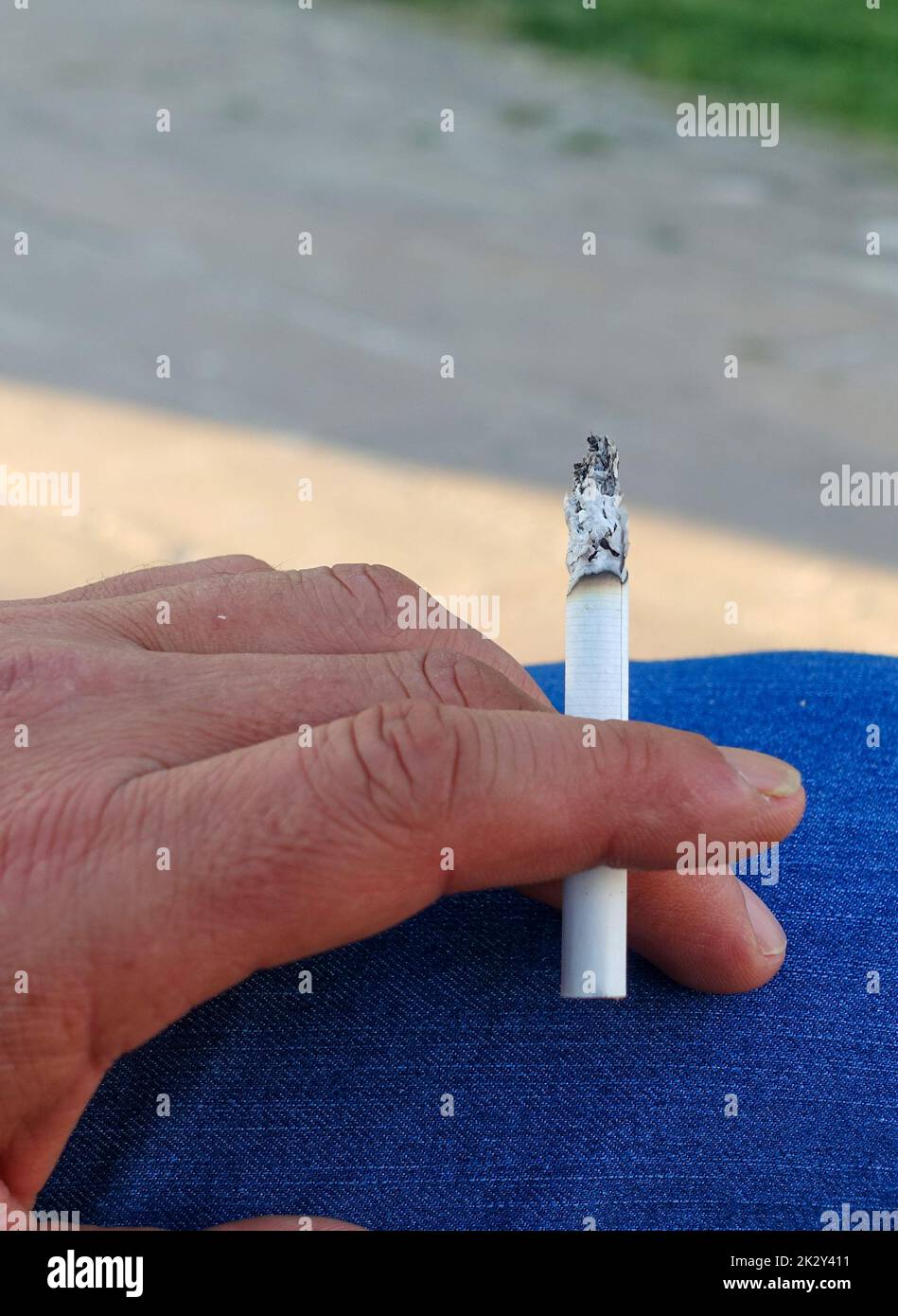 Hand holding smoke hi-res stock photography and images - Alamy