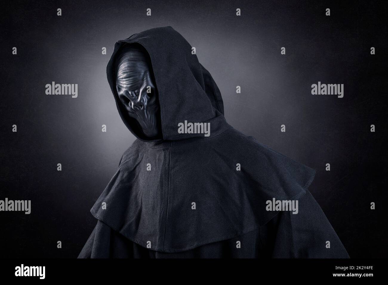 Mysterious humanoid alien at night over dark misty background Stock ...