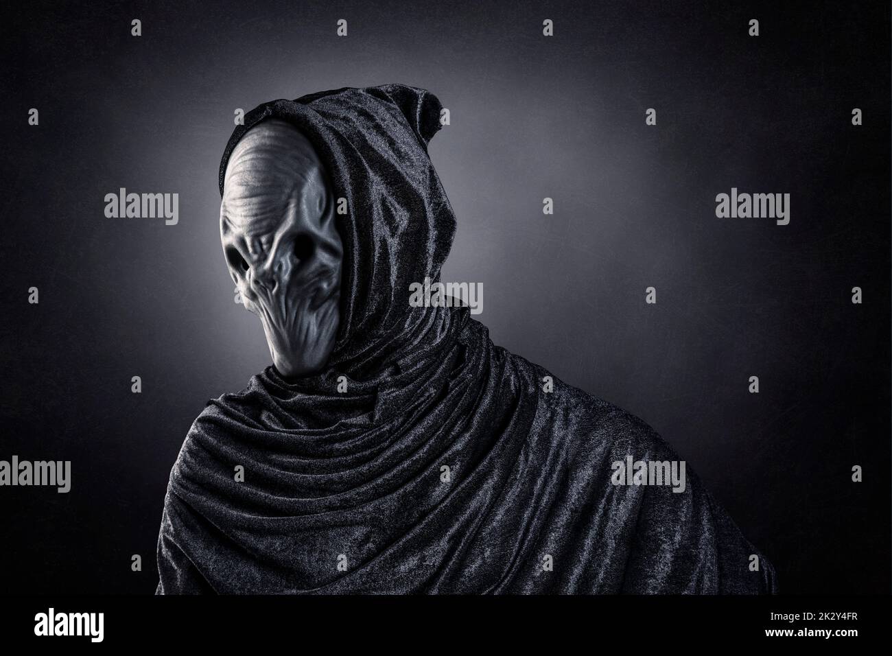 Mysterious humanoid alien at night over dark misty background Stock ...