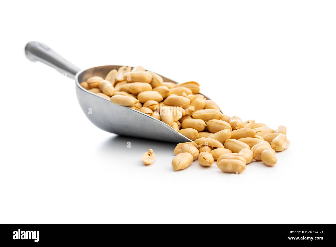 Roasted peeled peanuts in scoop isolated on white background Stock ...