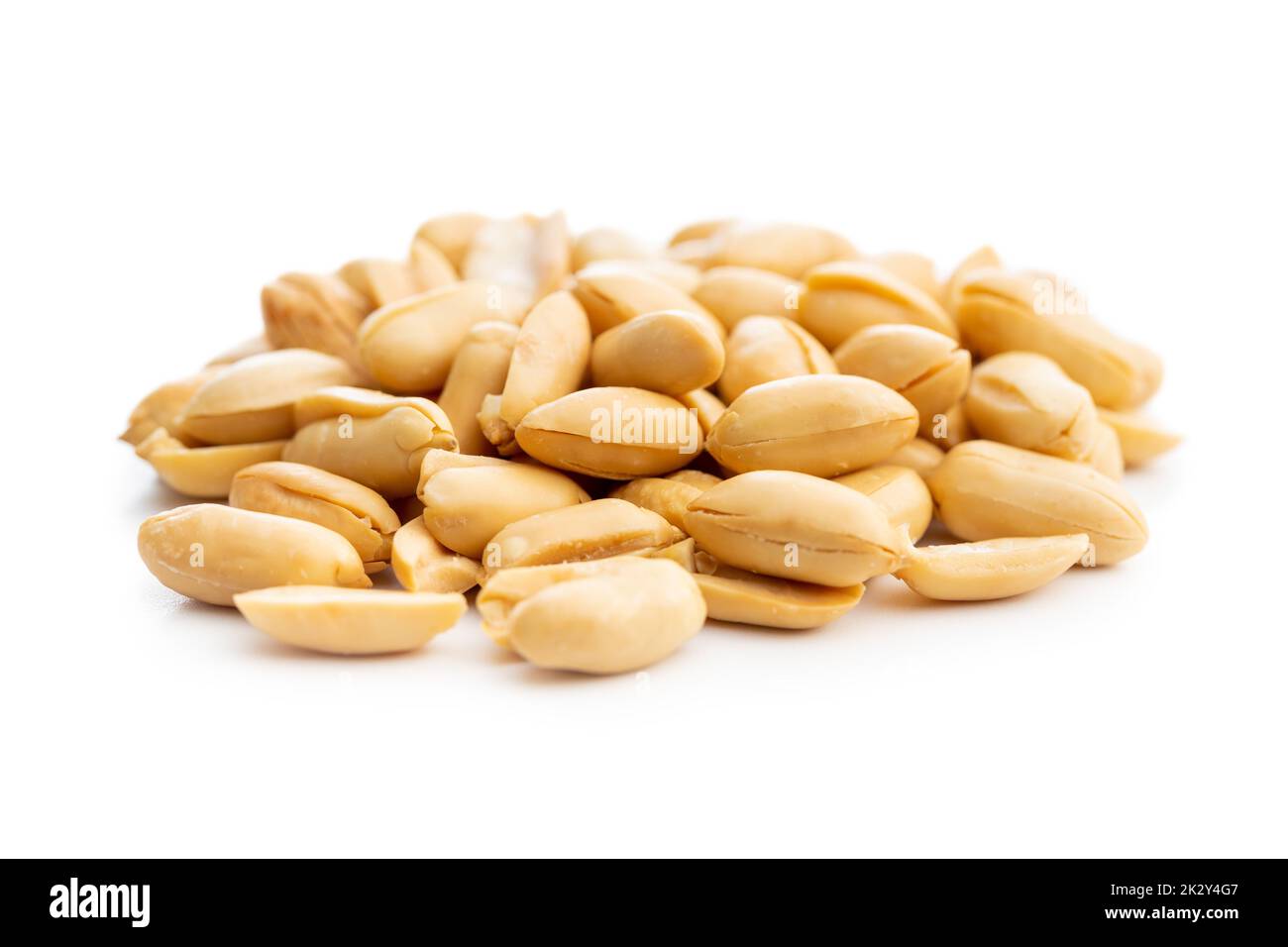 Roasted peeled peanuts isolated on white background Stock Photo - Alamy