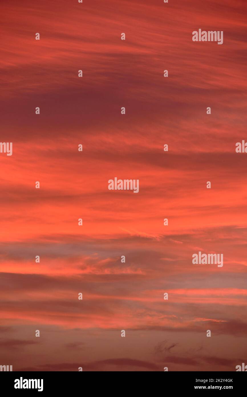 Sky light after sunset. orange background, clouds Stock Photo - Alamy