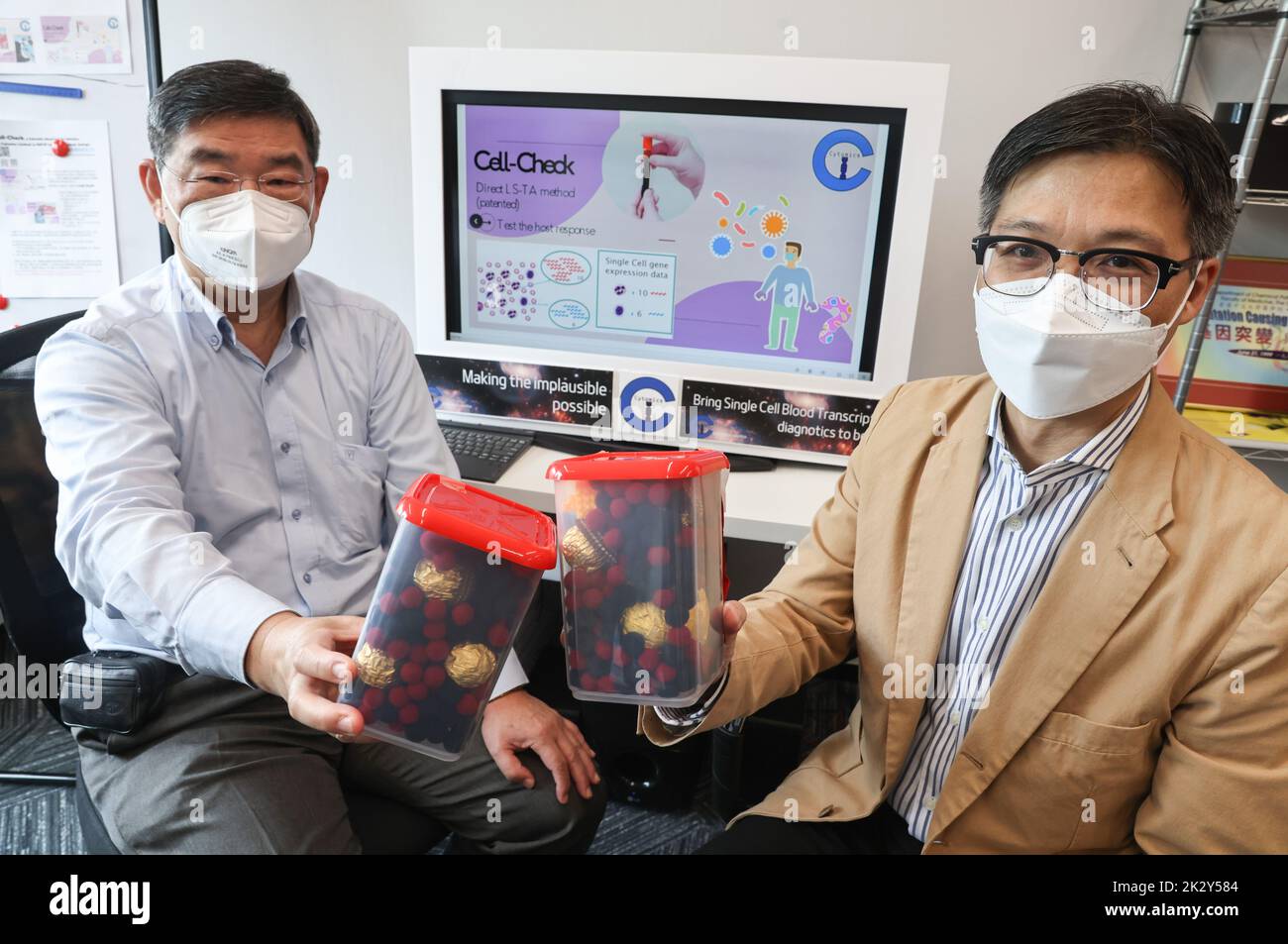 Leung Kwong-sak (left), Former Chairman of Computer Sciences and Nelson Tang Leung-sang ...