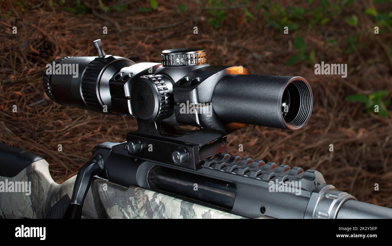 Scope on a hunting rifle in the outdoors as the sun sets Stock Photo ...