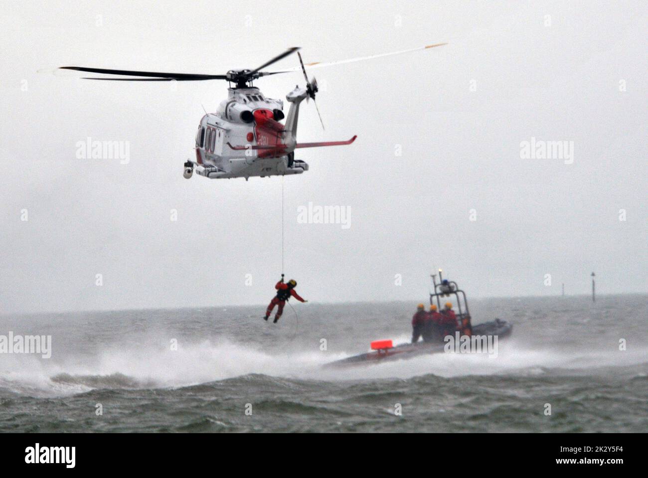 An air sea rescue demonstration keeps the crowd occupied beforeNew ...