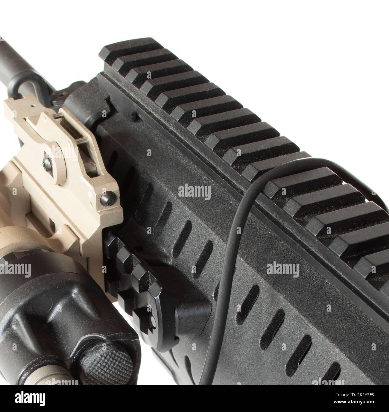 Tail cap and wire on a gun with a rail atop Stock Photo - Alamy