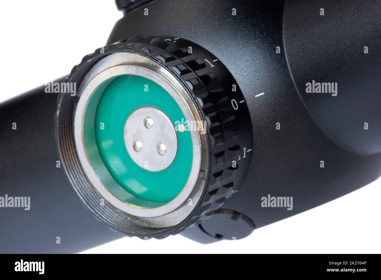 Compartment that holds an illuminuated rifle scope battery on white ...