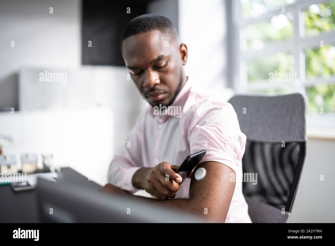 Patient Using Remote Continuous Glucose Blood Sugar Testing Stock Photo ...