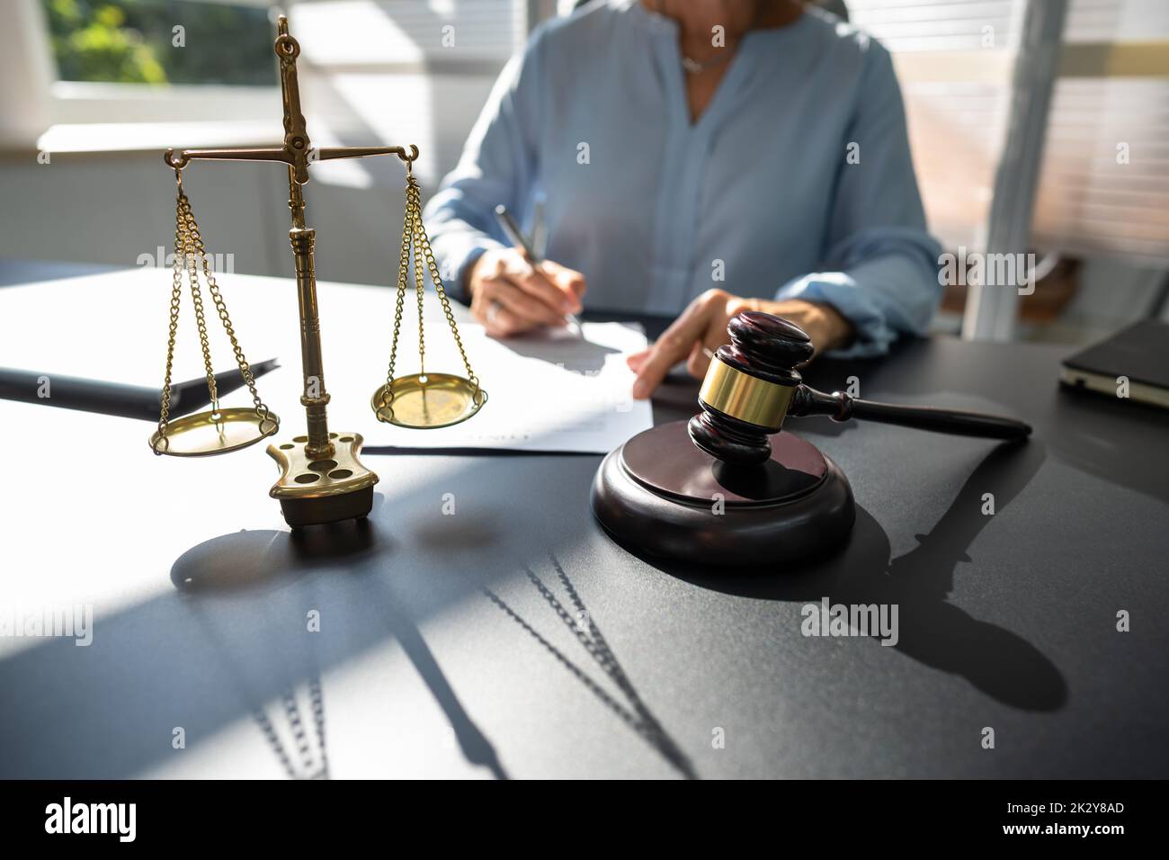 Judge With Gavel And Law Scale At Court Stock Photo - Alamy