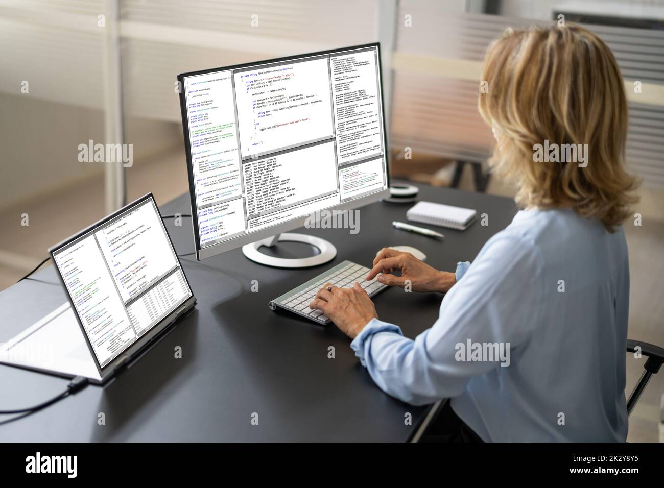 Female programmer using code develop hi-res stock photography and images - Alamy