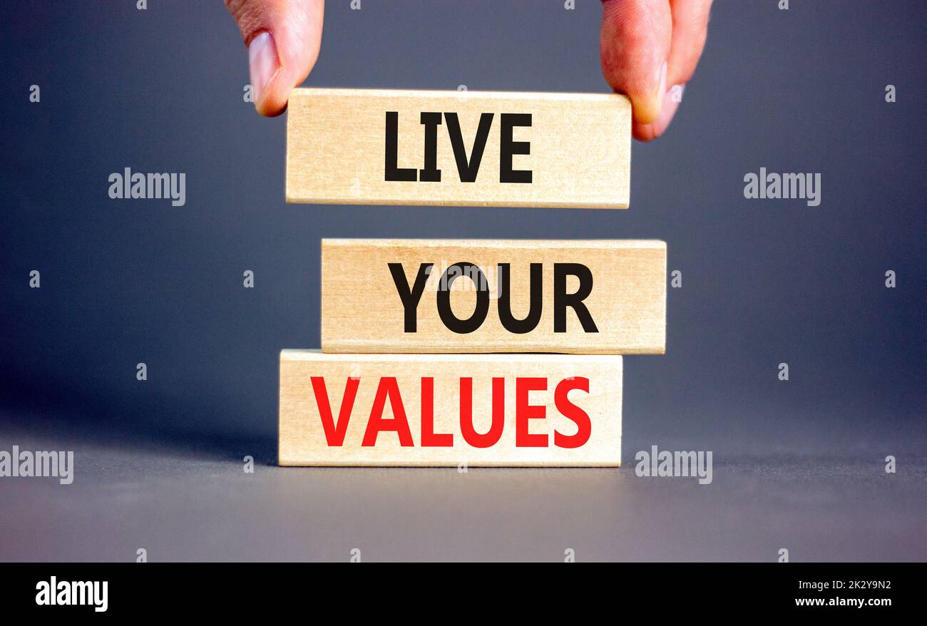 Live your values symbol. Concept words Live your values on wooden ...