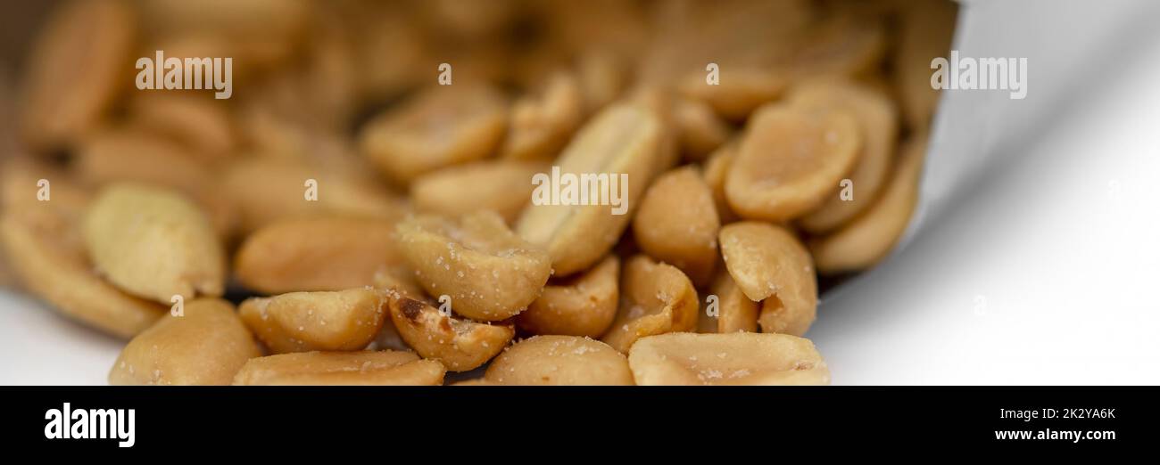Panorama of open packet of peanuts showing peanuts inside. Isolated ...
