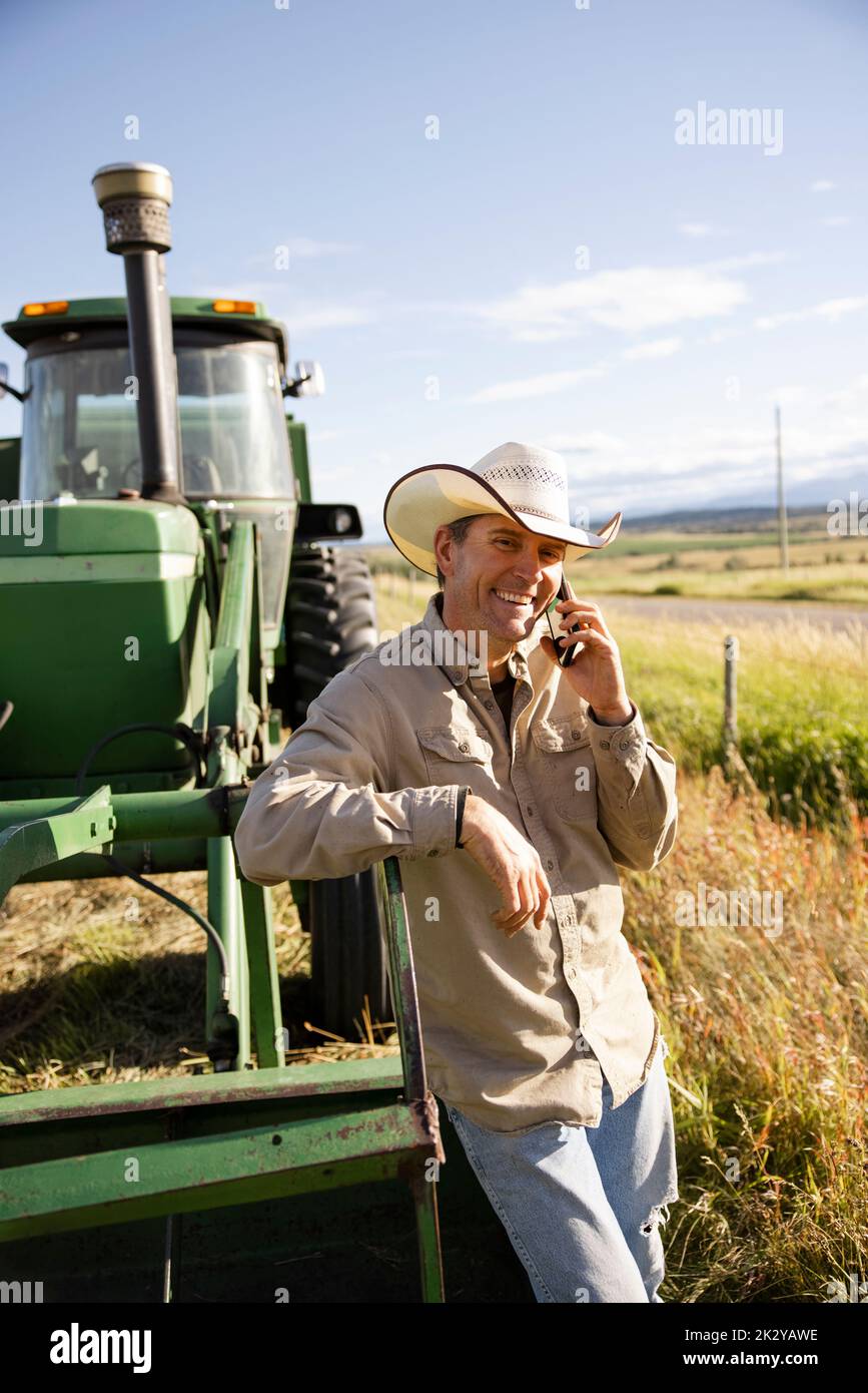 Happy farmer tractor hi-res stock photography and images - Alamy