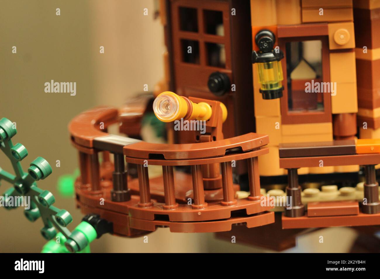 A closeup shot of a Lego treehouse room with a telescope Stock Photo ...
